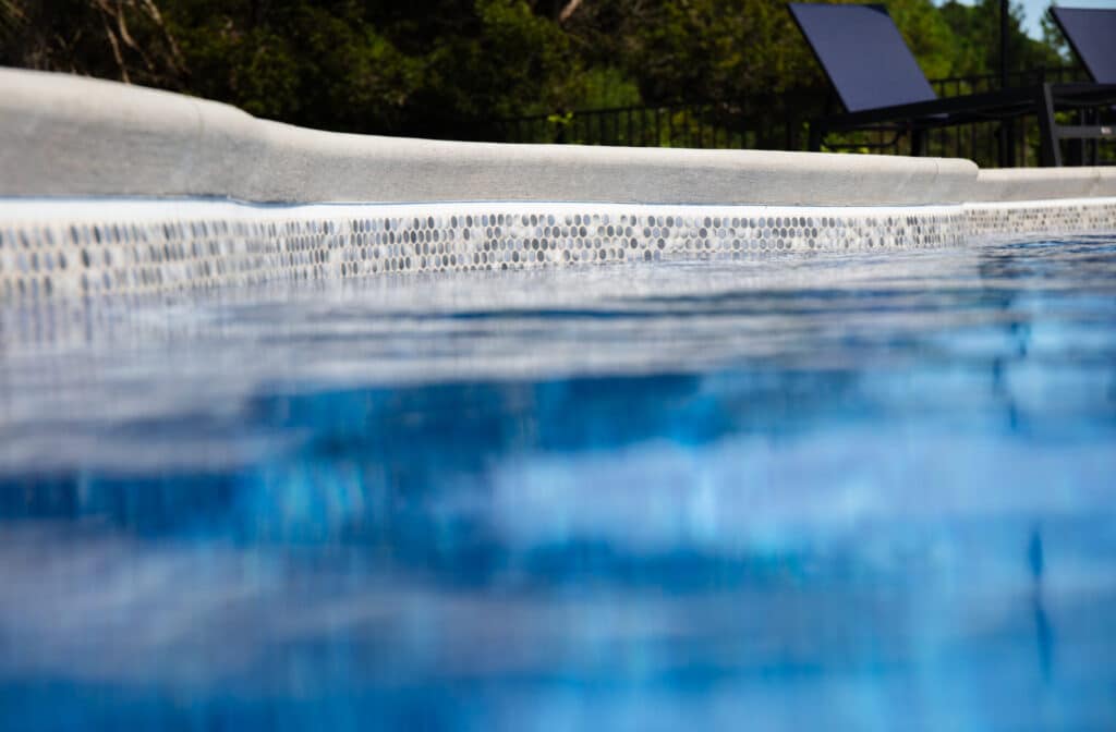 What Is A Pool Skimmer & Why Is It Important? - Premier Pools & Spas
