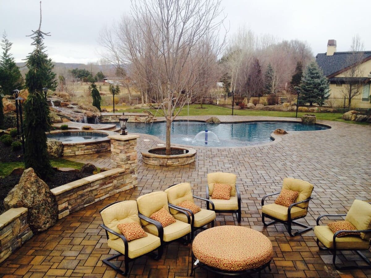 Pool Grotto With Slide Designs - Premier Pools & Spas